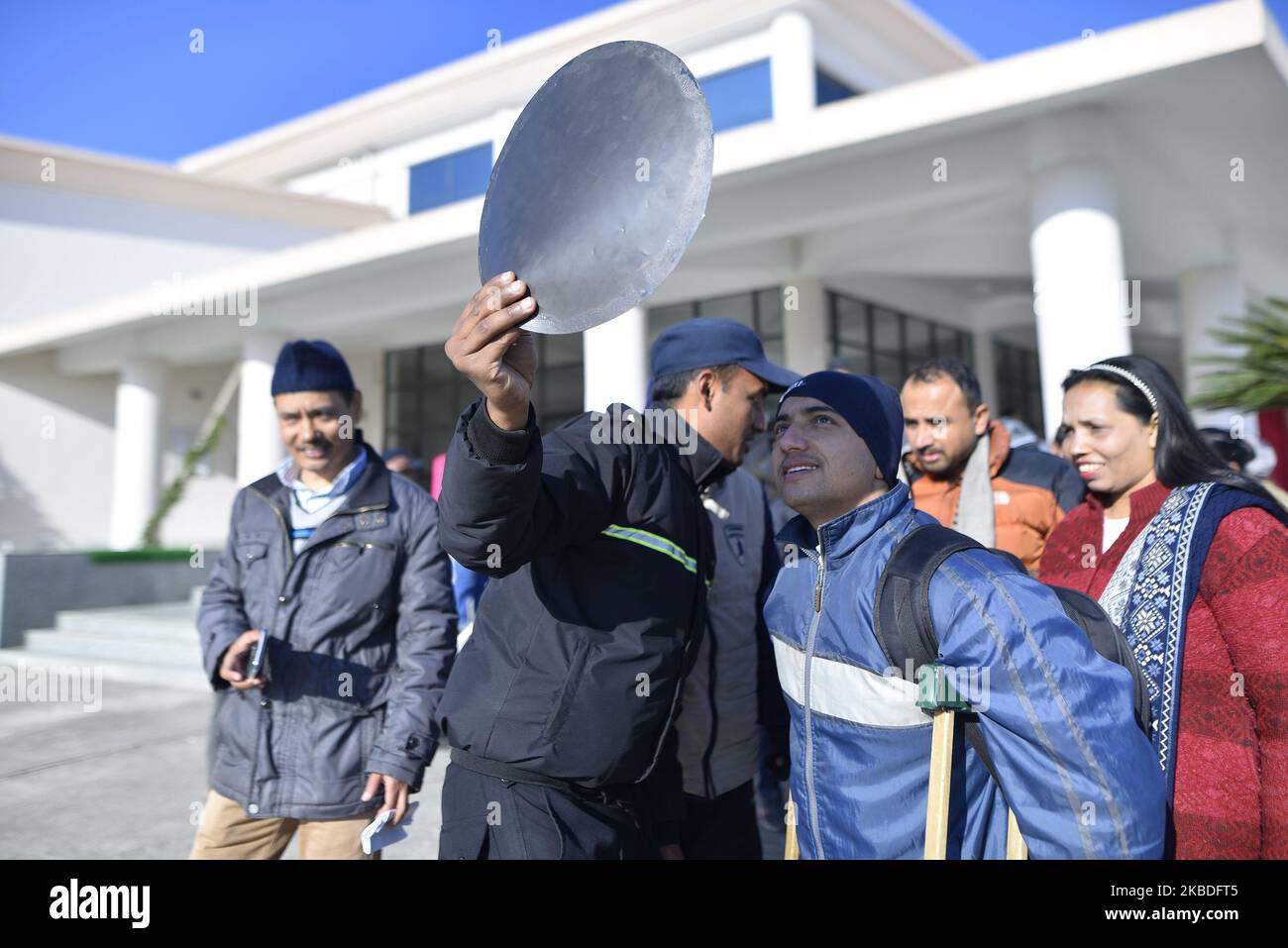 Nepalese people uses solar filter to watch a "Ring of Fire" Solar ...