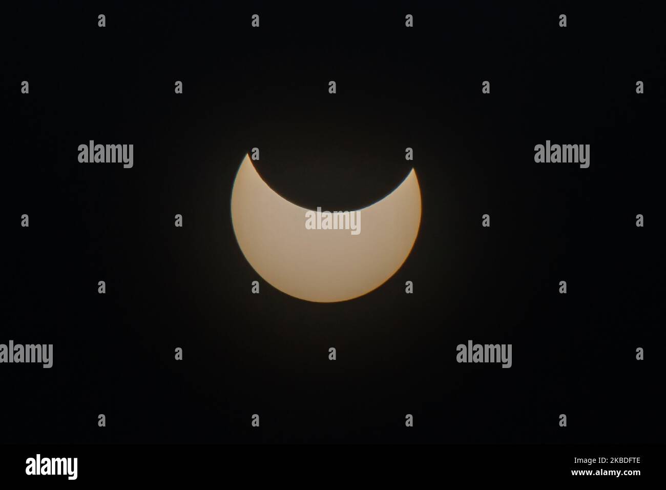 The partial solar eclipse is seen in Yogyakarta, Indonesia on December ...