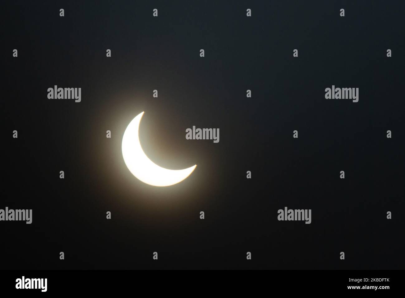 The partial solar eclipse is seen in Yogyakarta, Indonesia on December ...