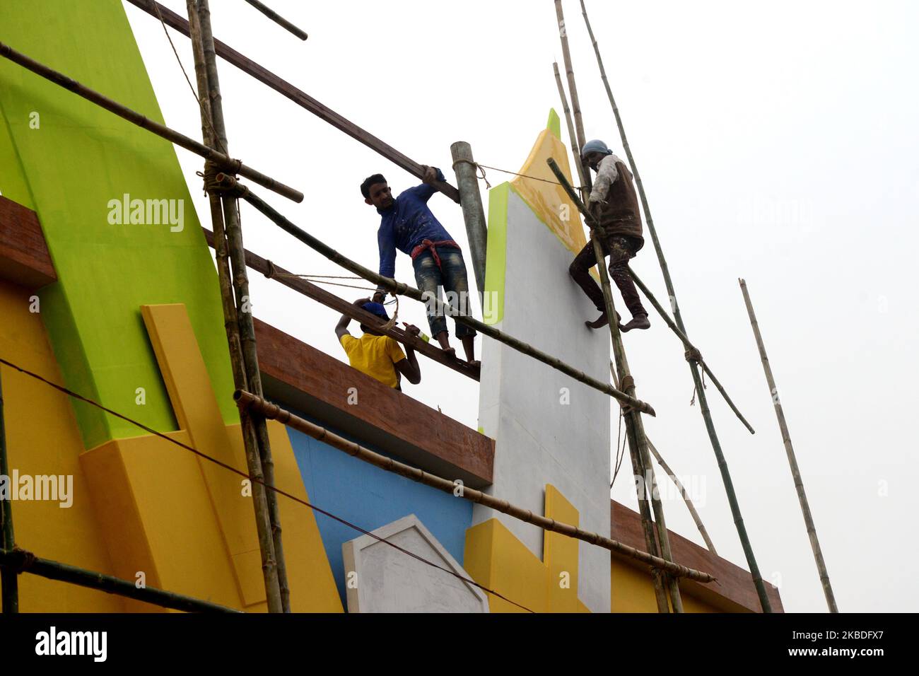 Bangladeshi day labor works at the construction site of Dhaka ...