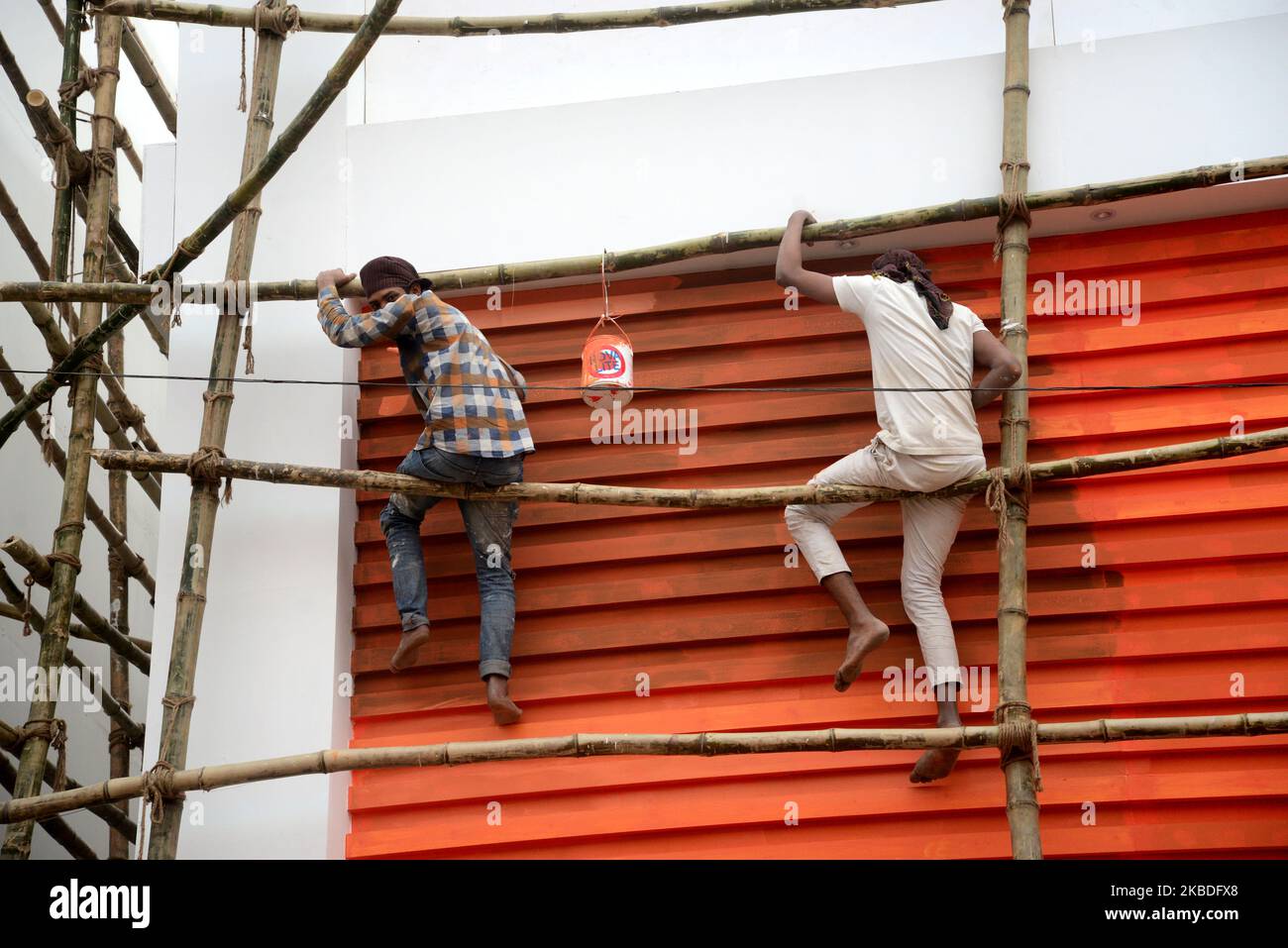 Bangladeshi day labor works at the construction site of Dhaka ...