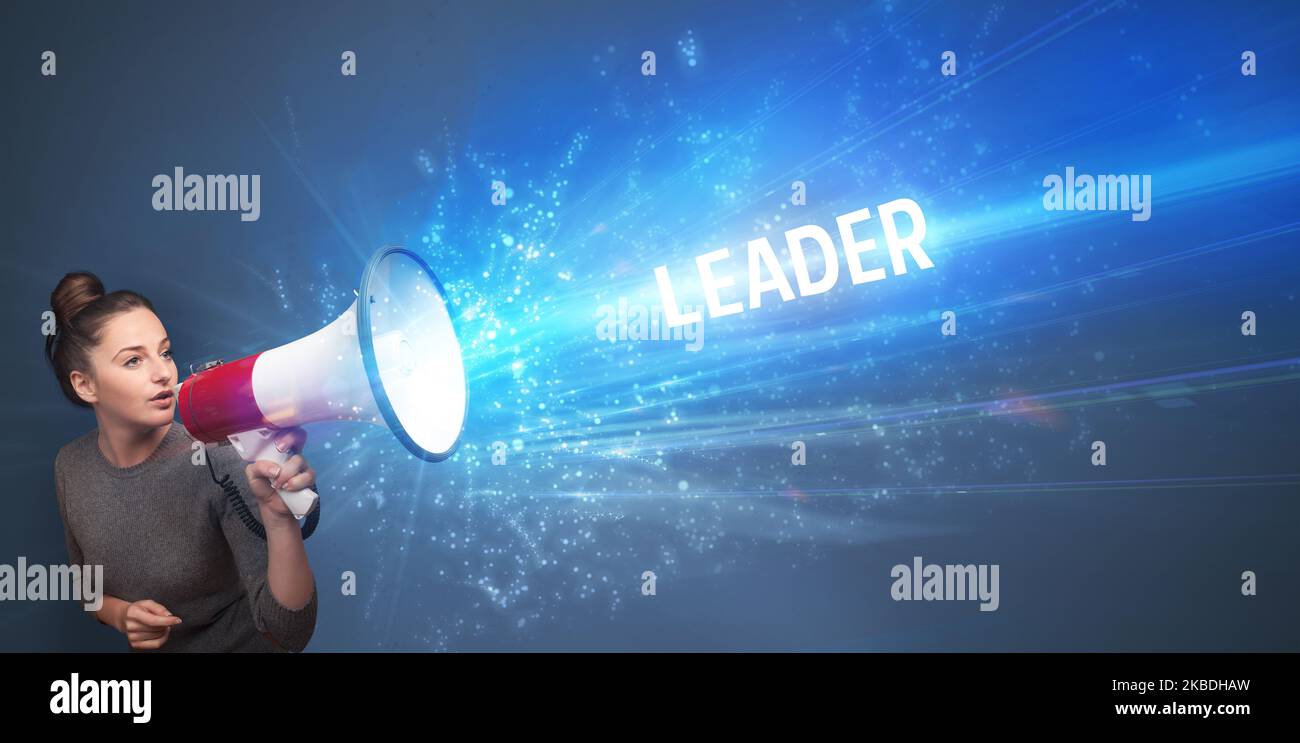 Young person shouting in loudspeaker Stock Photo - Alamy
