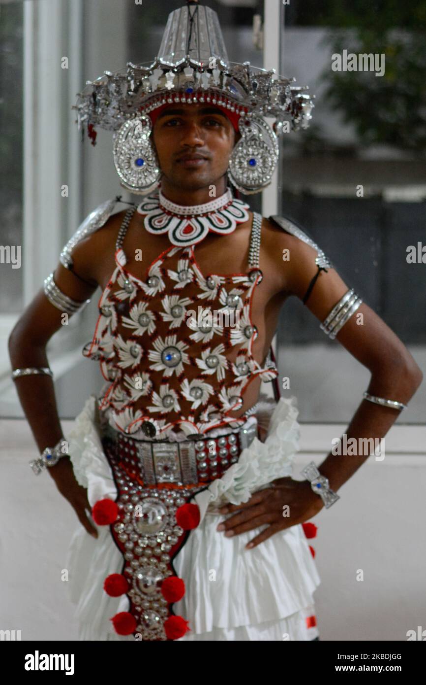 A Sri Lankan traditional dancer pose a picture at Kotte Rajamaha ...