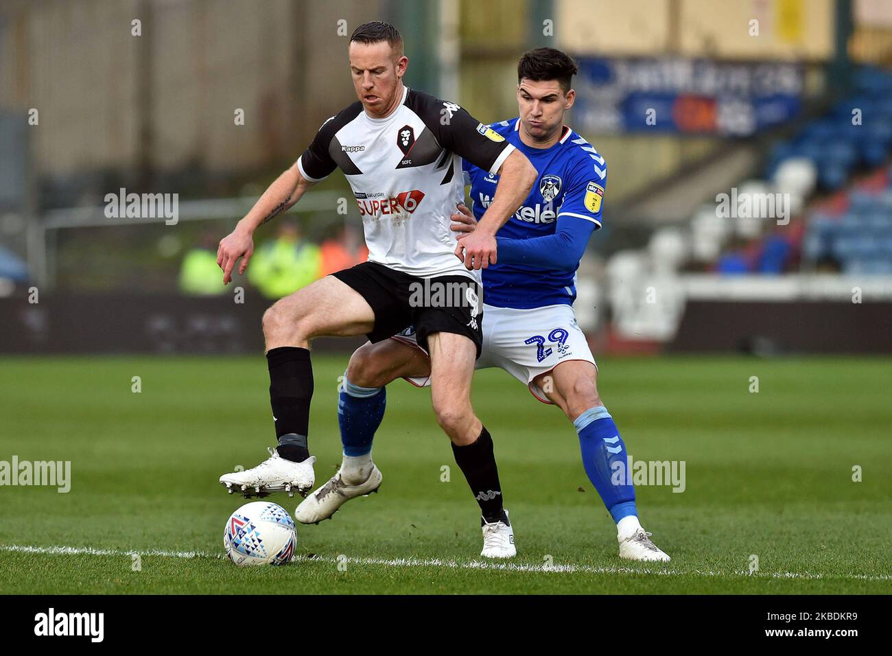 Tomas Egert of Oldham Athletic and Adam Rooney of Salford City during ...