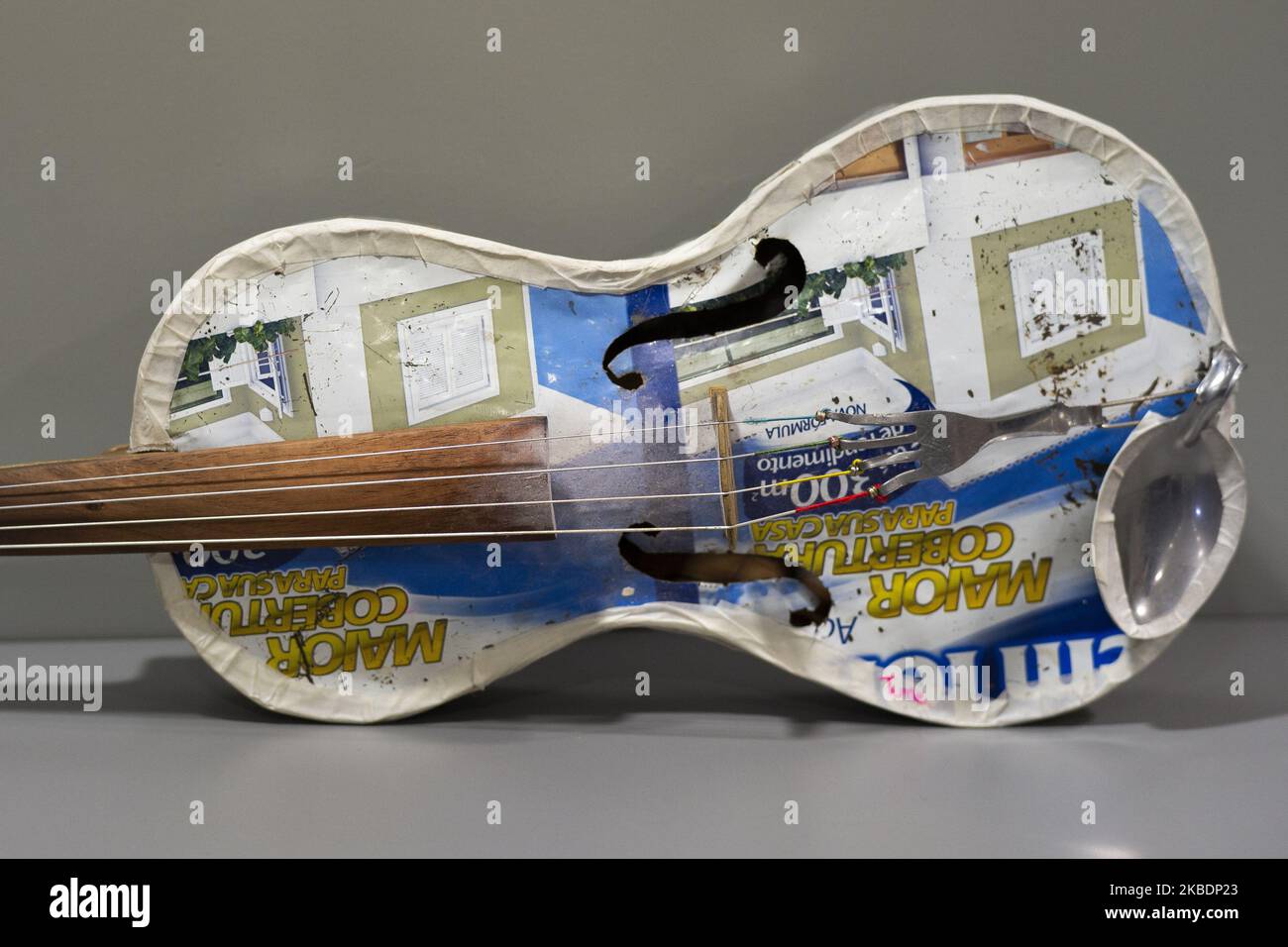 A recycled instrument of the musicians of the ‘Orquesta de Instrumentos ...