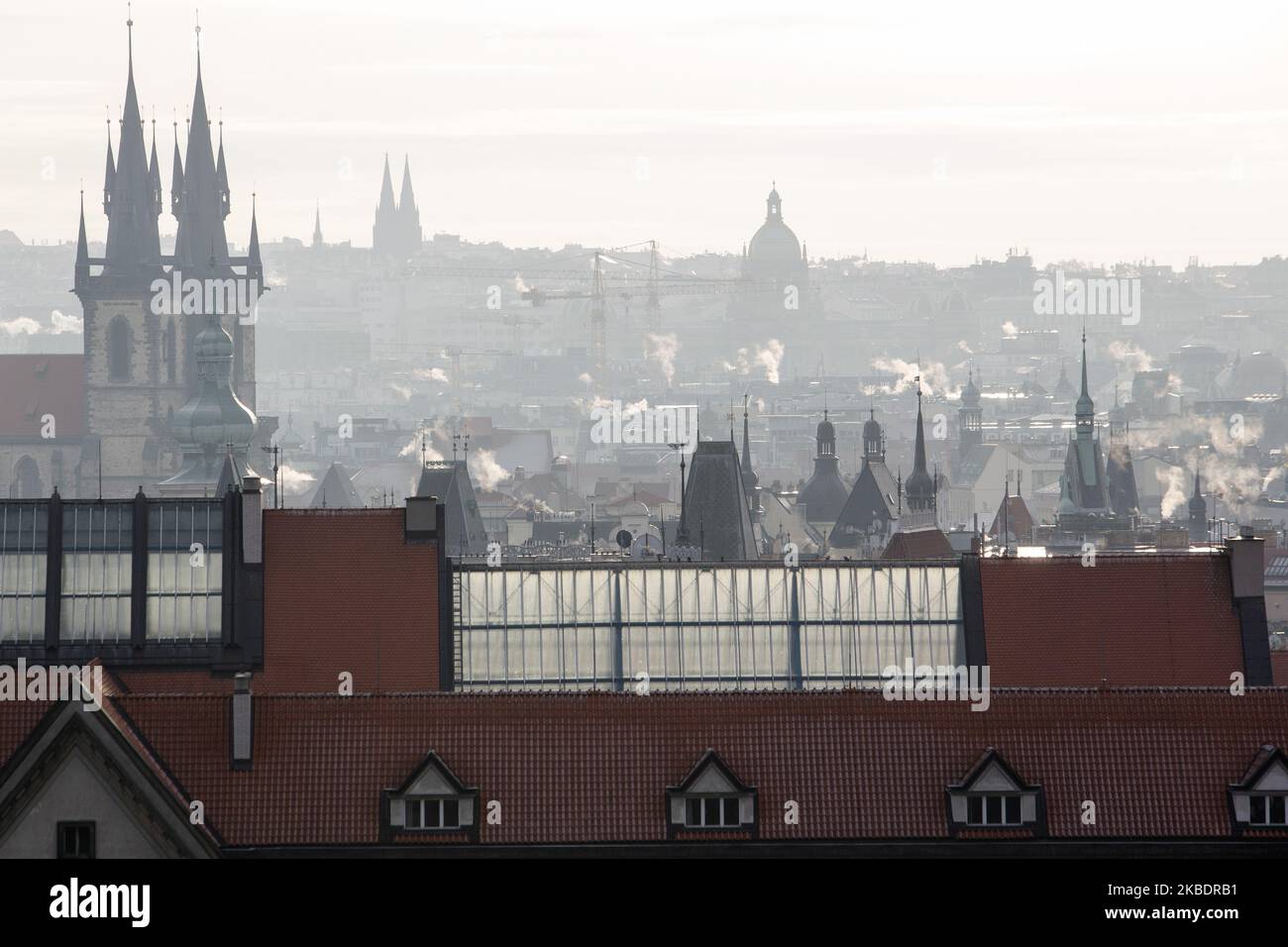 Smoky chimneys at the panorama of Old Town pictured during frosty ...