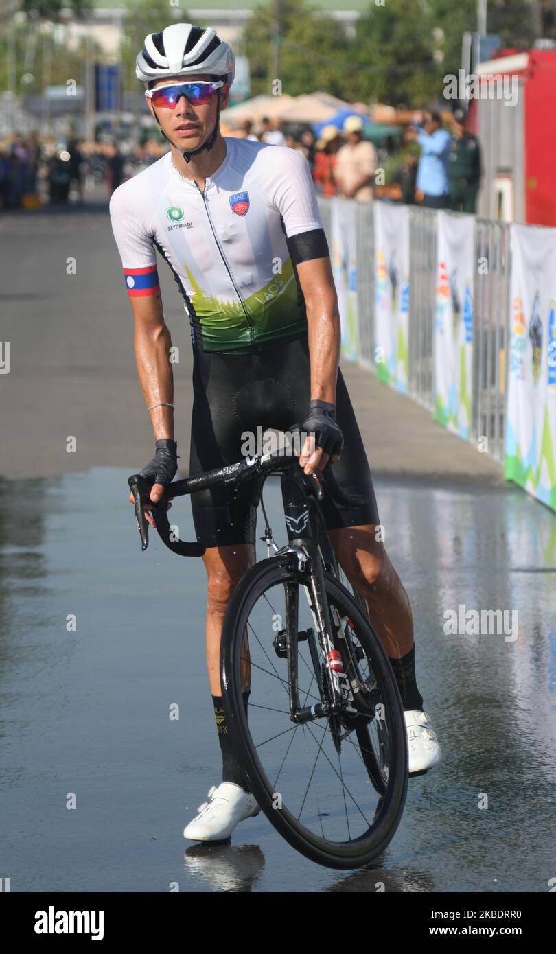 Ariya Phounsavath of Laos national team awaits for the second rider ...