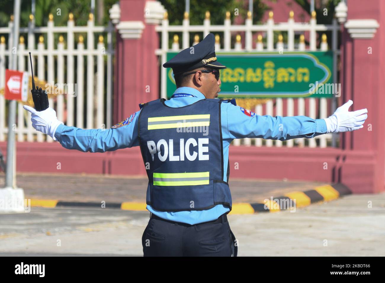 A member of Cambodian Police forces seen at the finish line of the ...