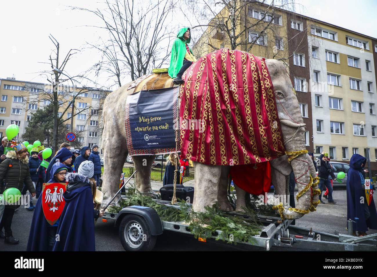A man dressed as magus Balthazar rides an elephant during celebration ...
