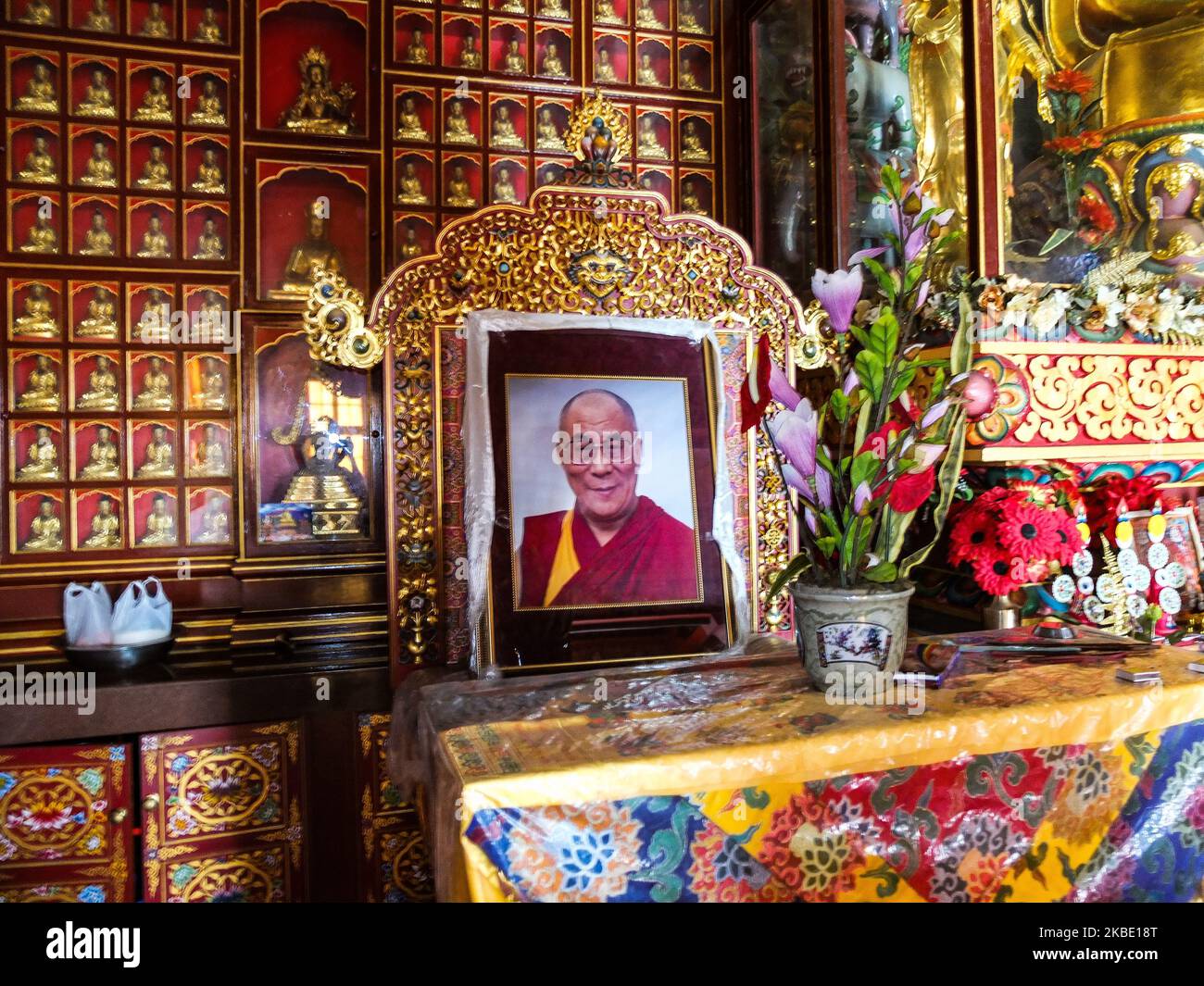 A shrine for the Dali Lama sits on display for visiting Buddhists at ...