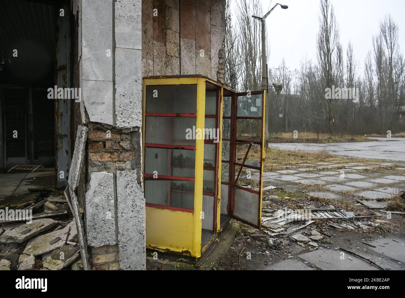 Old classic soviet yellow telephone booth on street of abandoned ghost ...