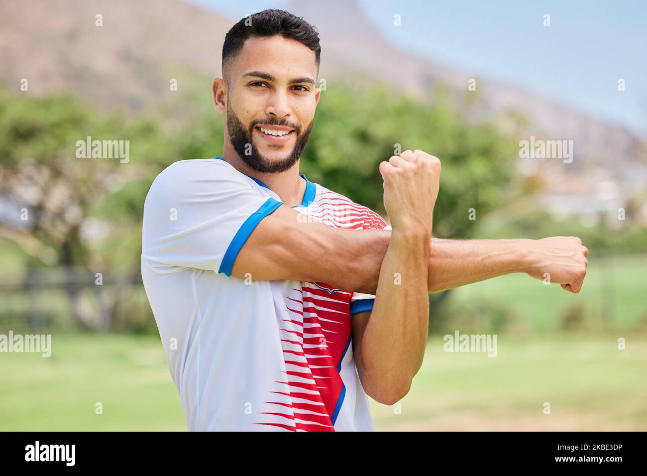 Fitness, portrait and soccer player stretching in training, workout and ...