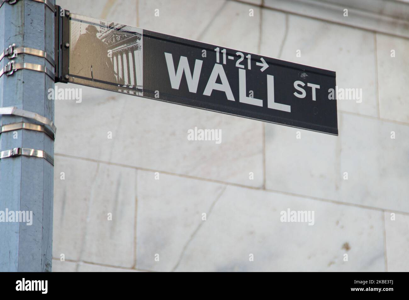 Wall Street sign inscription as seen on various buildings, Wall St ...