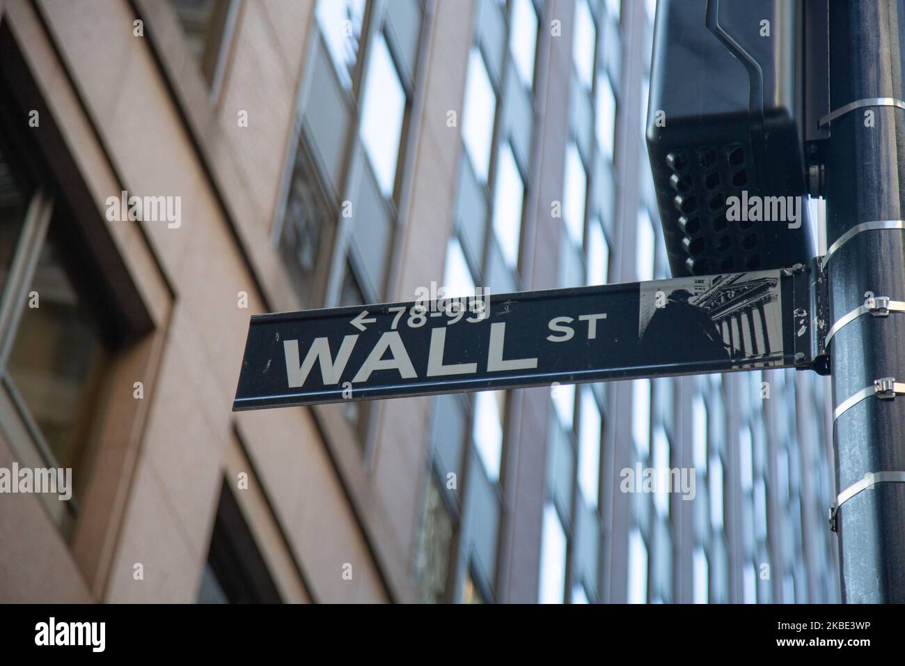 Wall Street sign inscription as seen on various buildings, Wall St ...
