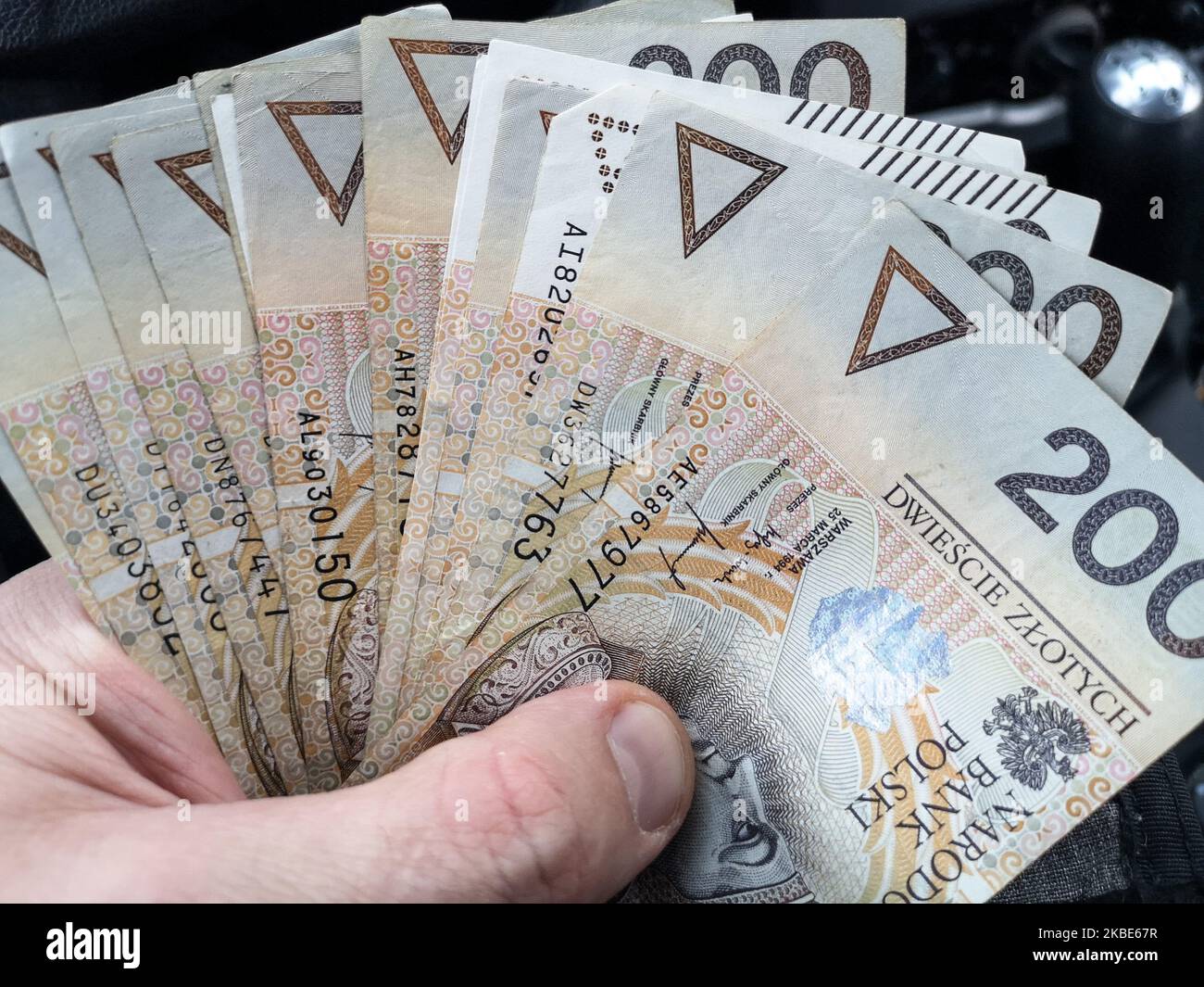 Polish PLN (Polish zloty) banknotes are seen in Gdansk, Poland on 3 ...