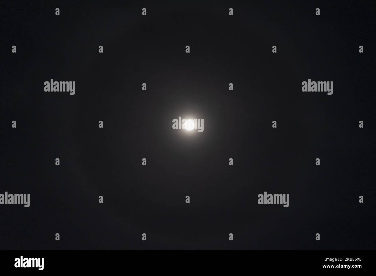 Penumbra lunar eclipse surrounded by a rainbow ring was seen in ...