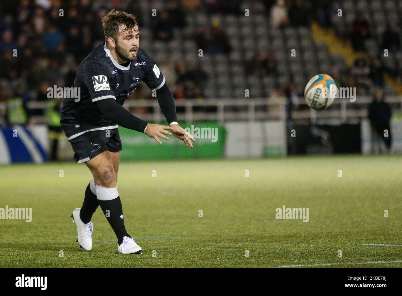 George McGuigan of Newcastle Falcons passes during the Greene King IPA ...