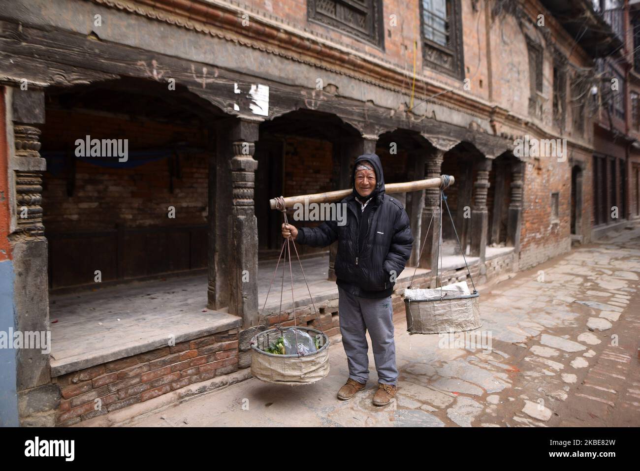 An Old Man arrives towards his home after selling vegetables in the ...