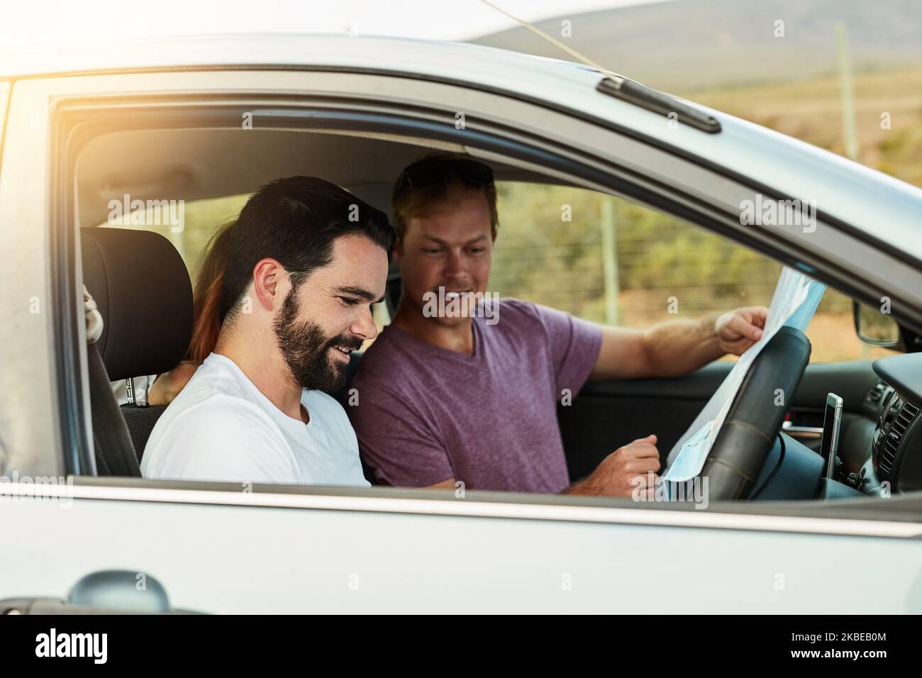 Im driving first. a group of young friends getting ready to drive to ...