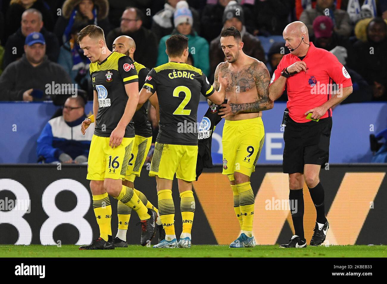 Referee Lee Mason books Danny Ings (9) of Southampton for removing his ...