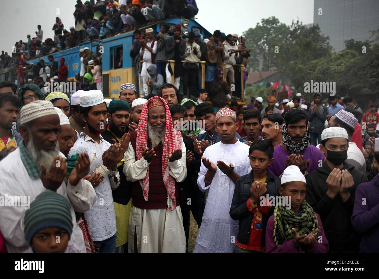 Muslim devotees pray the final prayer of Bishwa Ijtema, which is ...