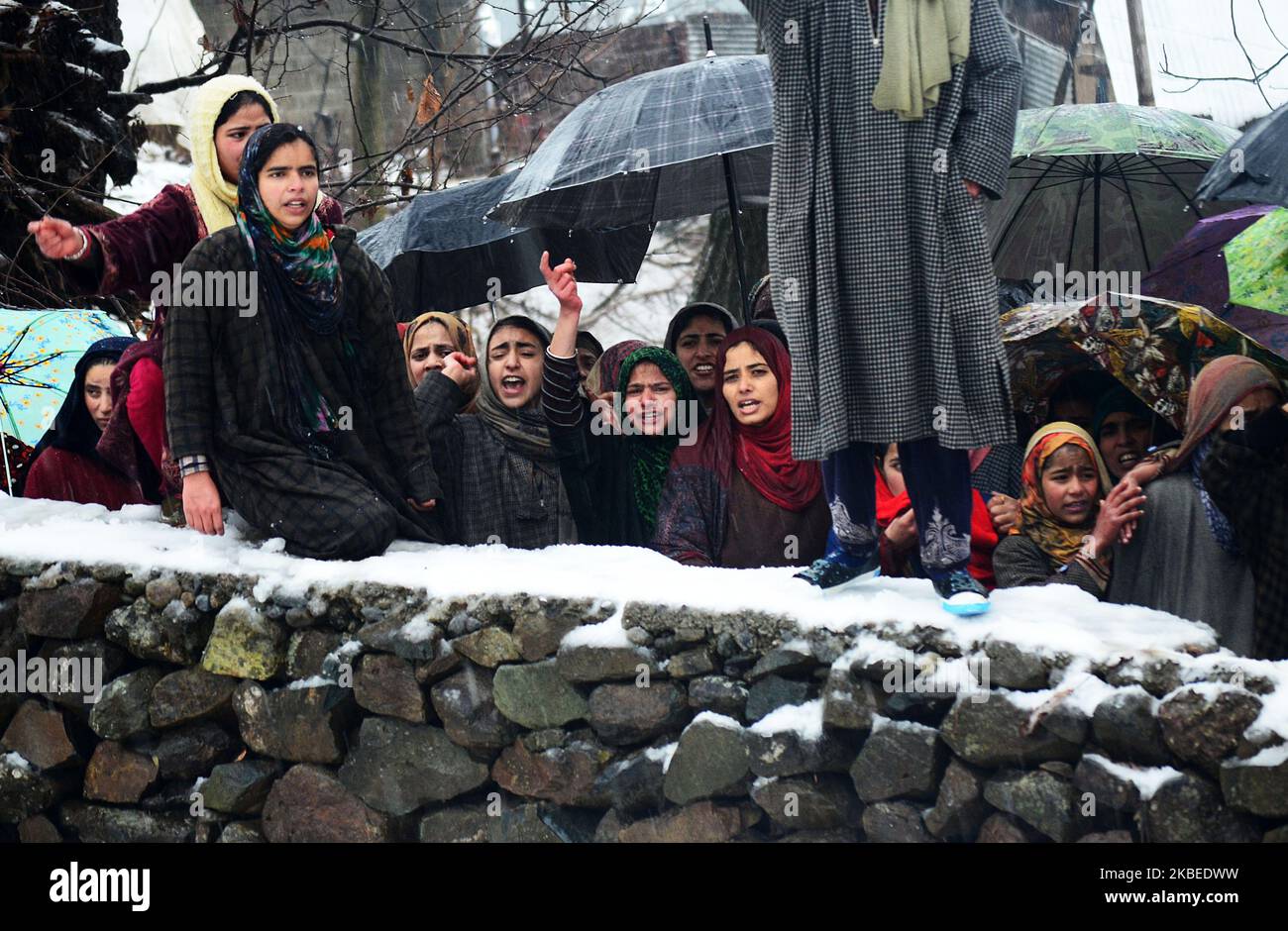 Amid snow and rainfall women shouting freedom slogans during the ...