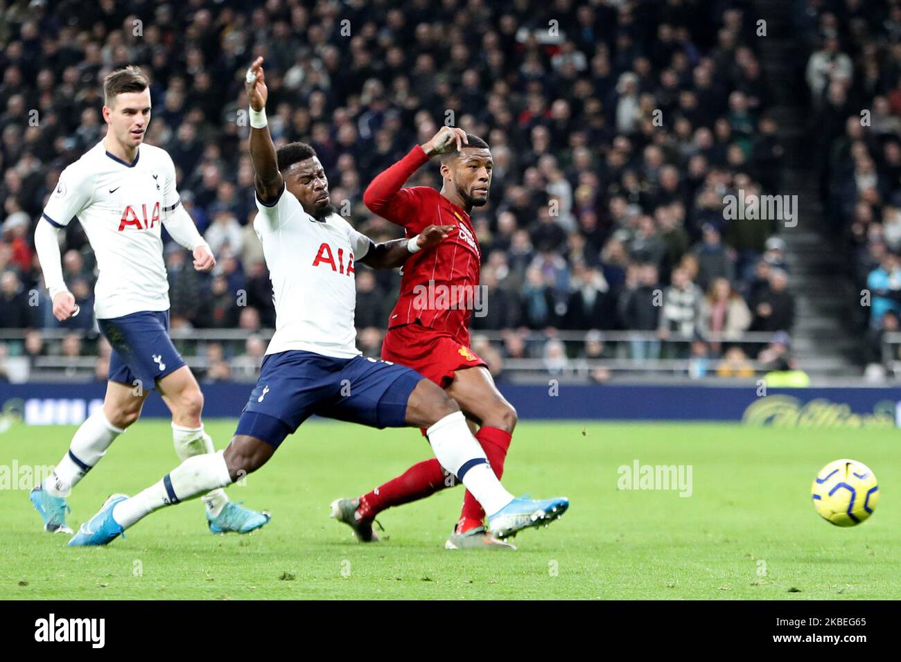 Tottenham defender serge aurier tackles liverpool midfielder georginio ...