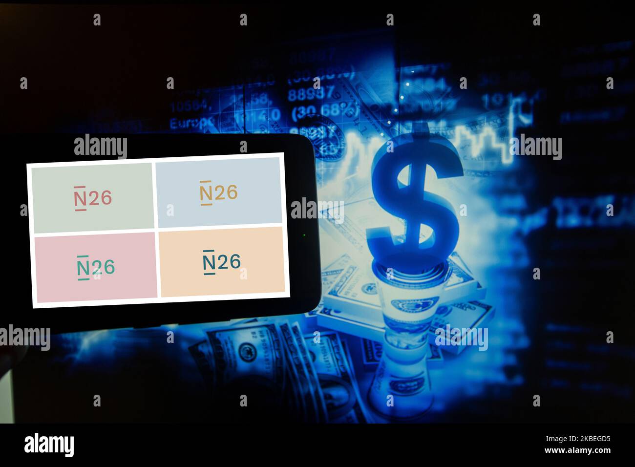 The logo of N26 is seen on a screen of a smartphone next to an ...