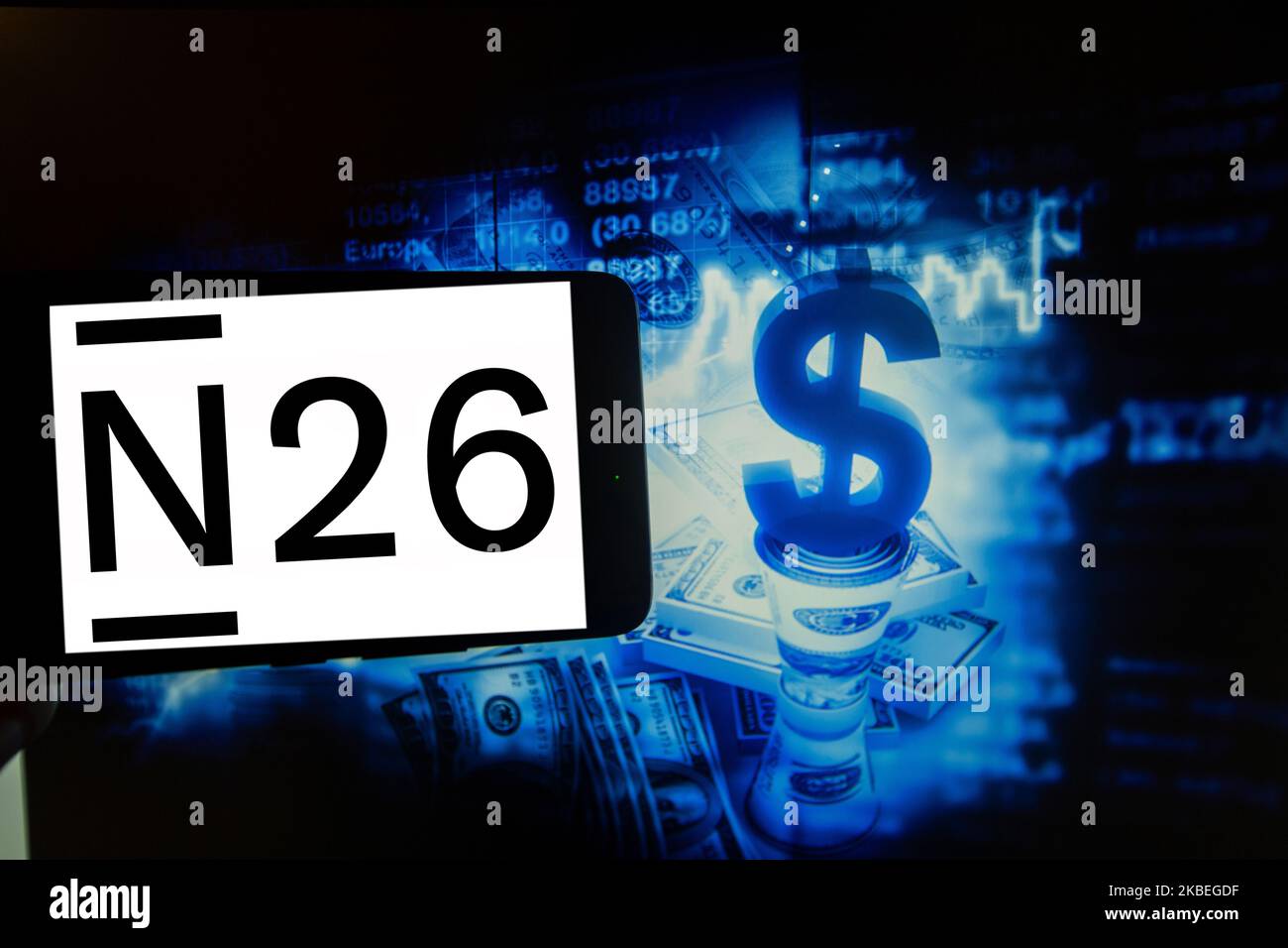 The logo of N26 is seen on a screen of a smartphone next to an ...