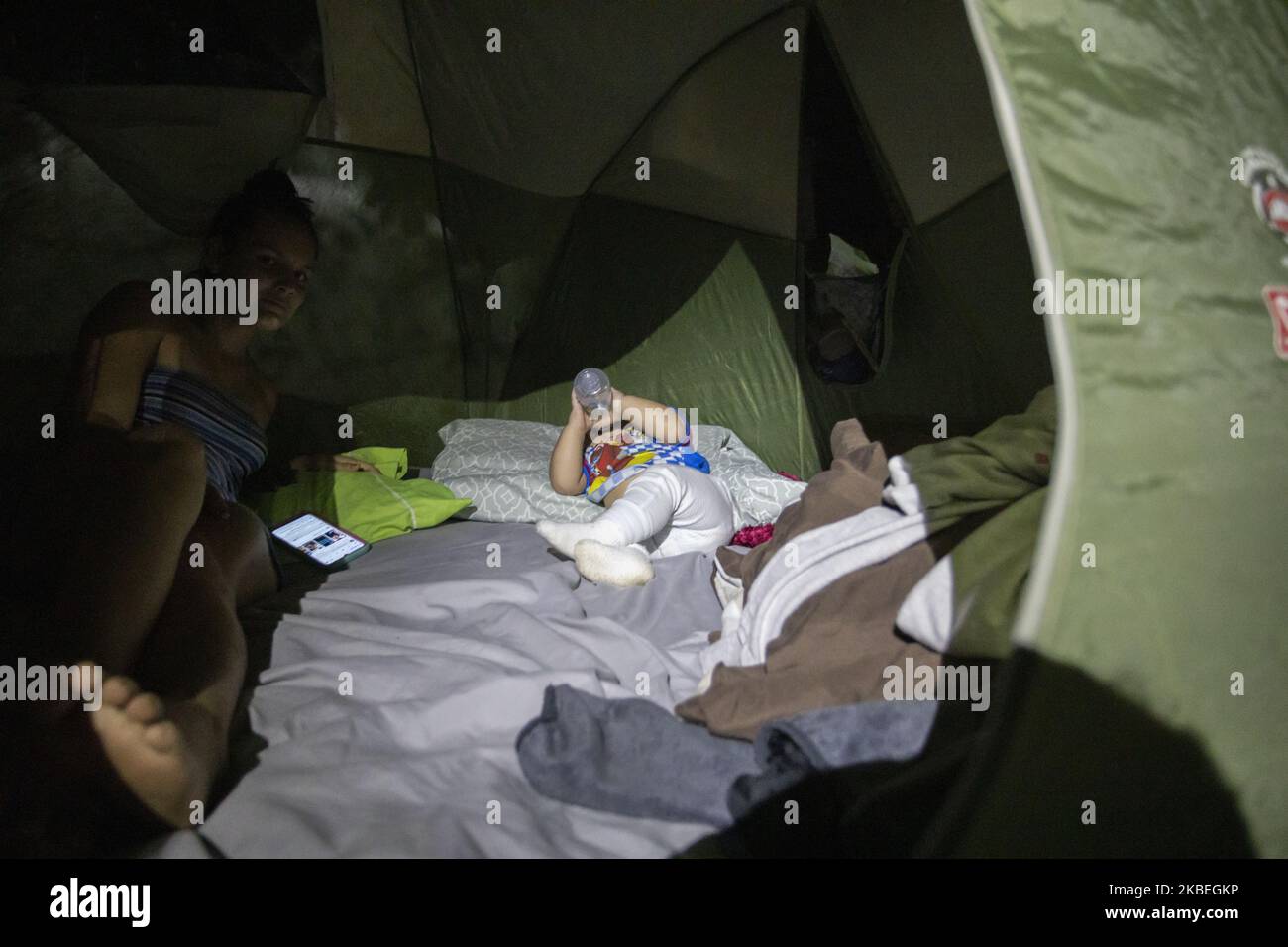 Residents sleeps and spend all the day outside their house due to the ...