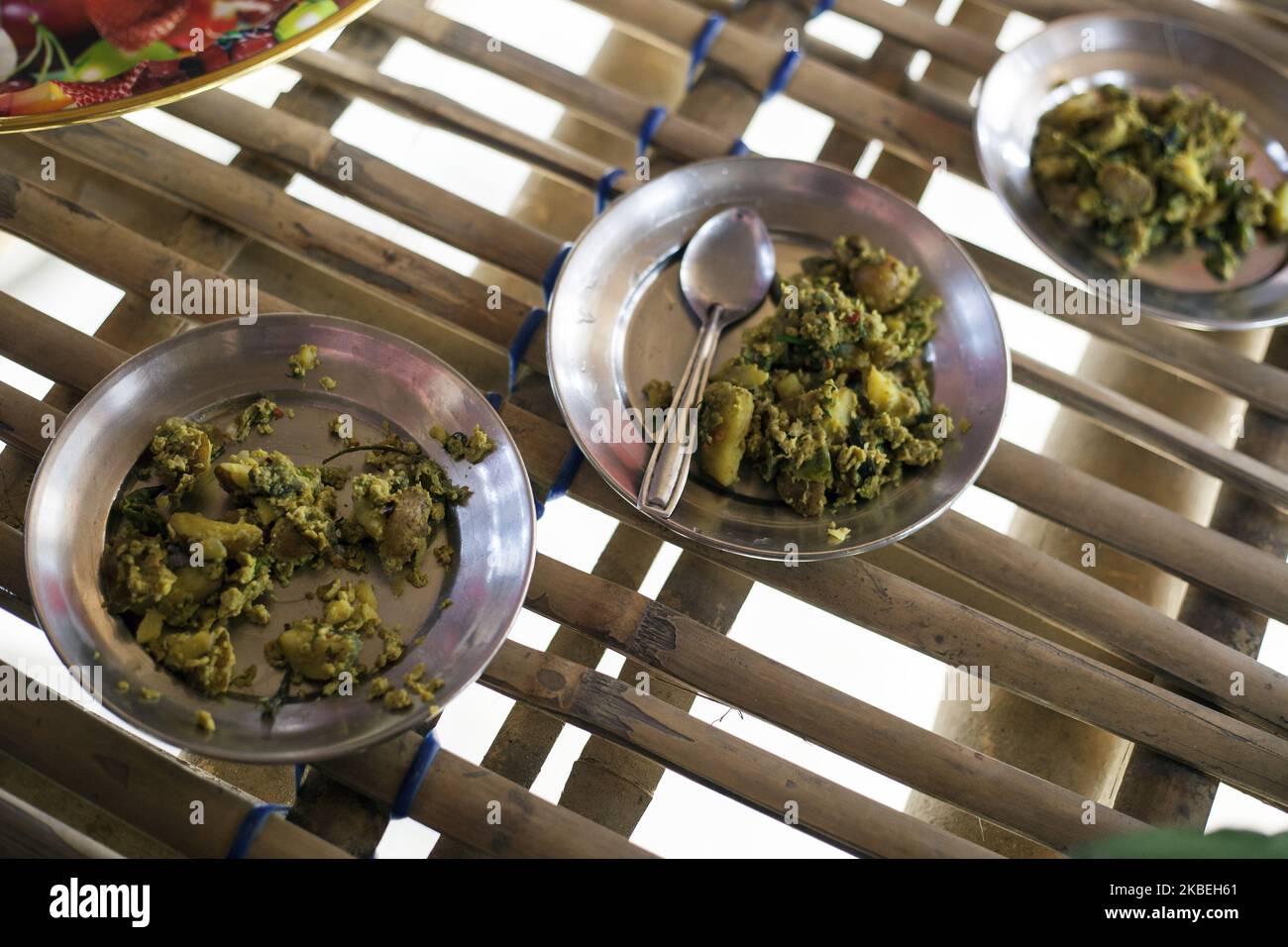 Traditional Assamese dish made from potatoes chillies and coriander ...