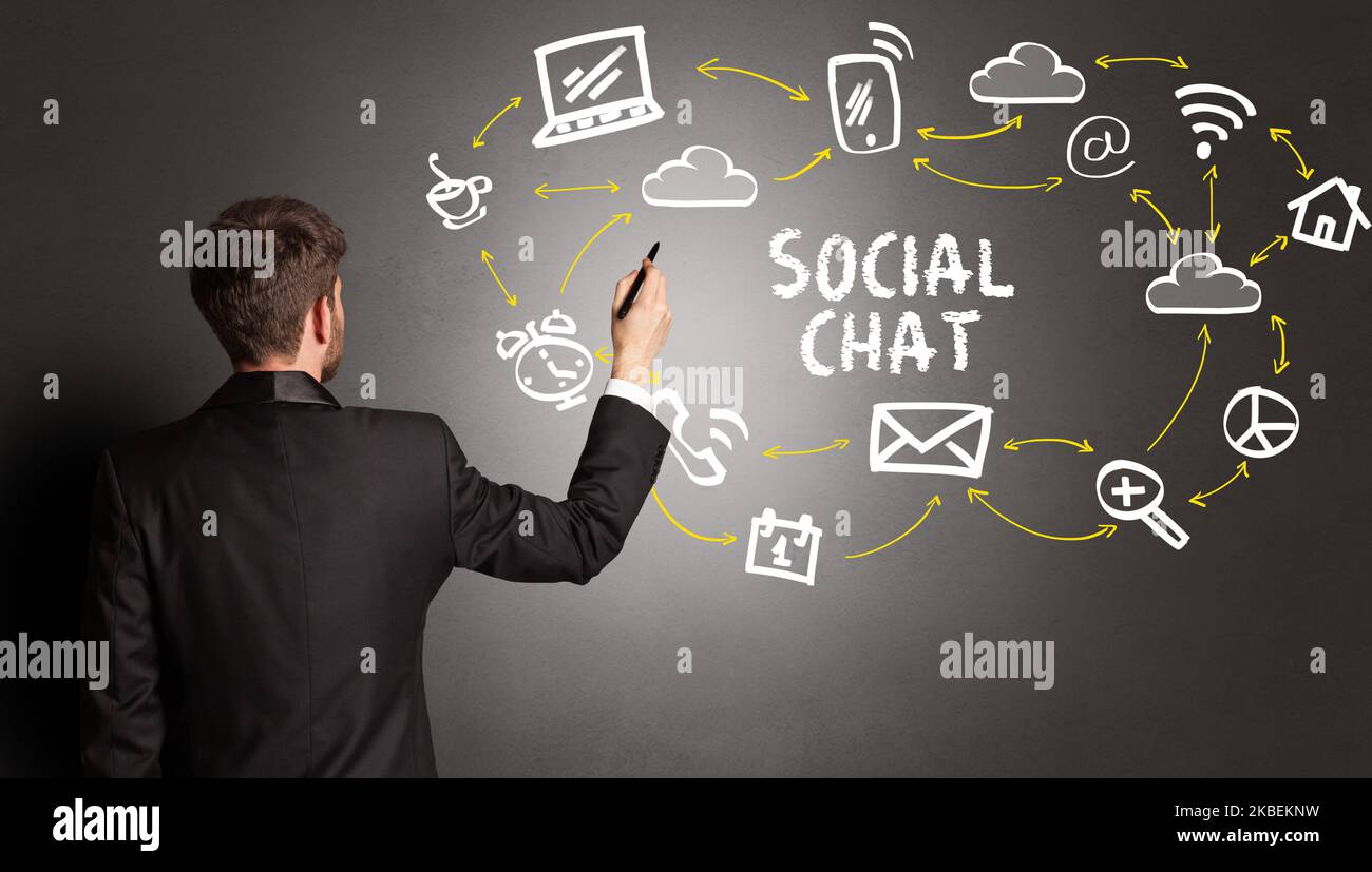 businessman drawing social media icons Stock Photo - Alamy