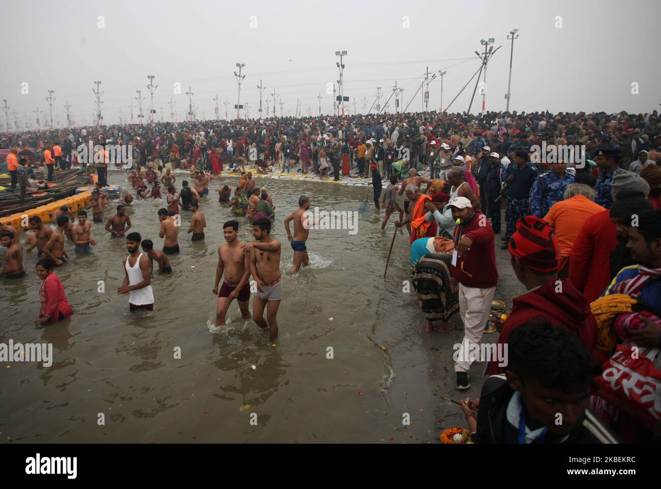 Hindu devotees take holy dip hi-res stock photography and images - Alamy