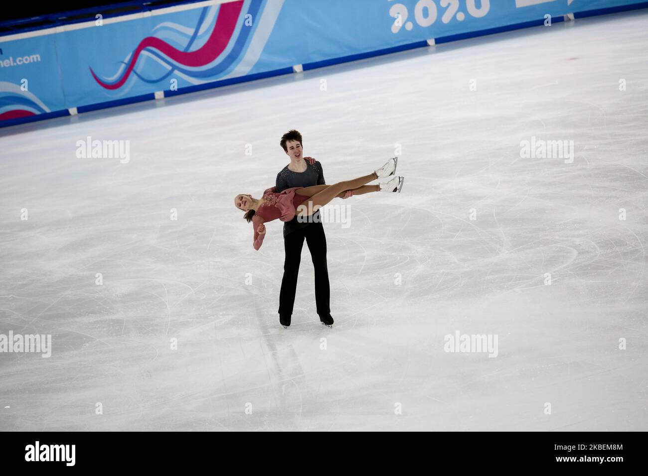 McIntosh Brooke and Toste Brandon from Canada compete in the Figure ...
