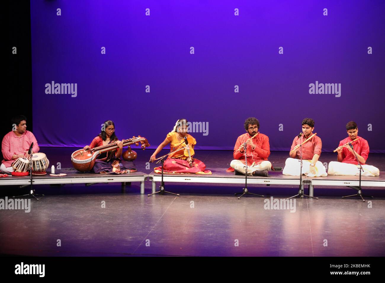 Tamil youth perform a classical song in the traditional Carnatic style ...