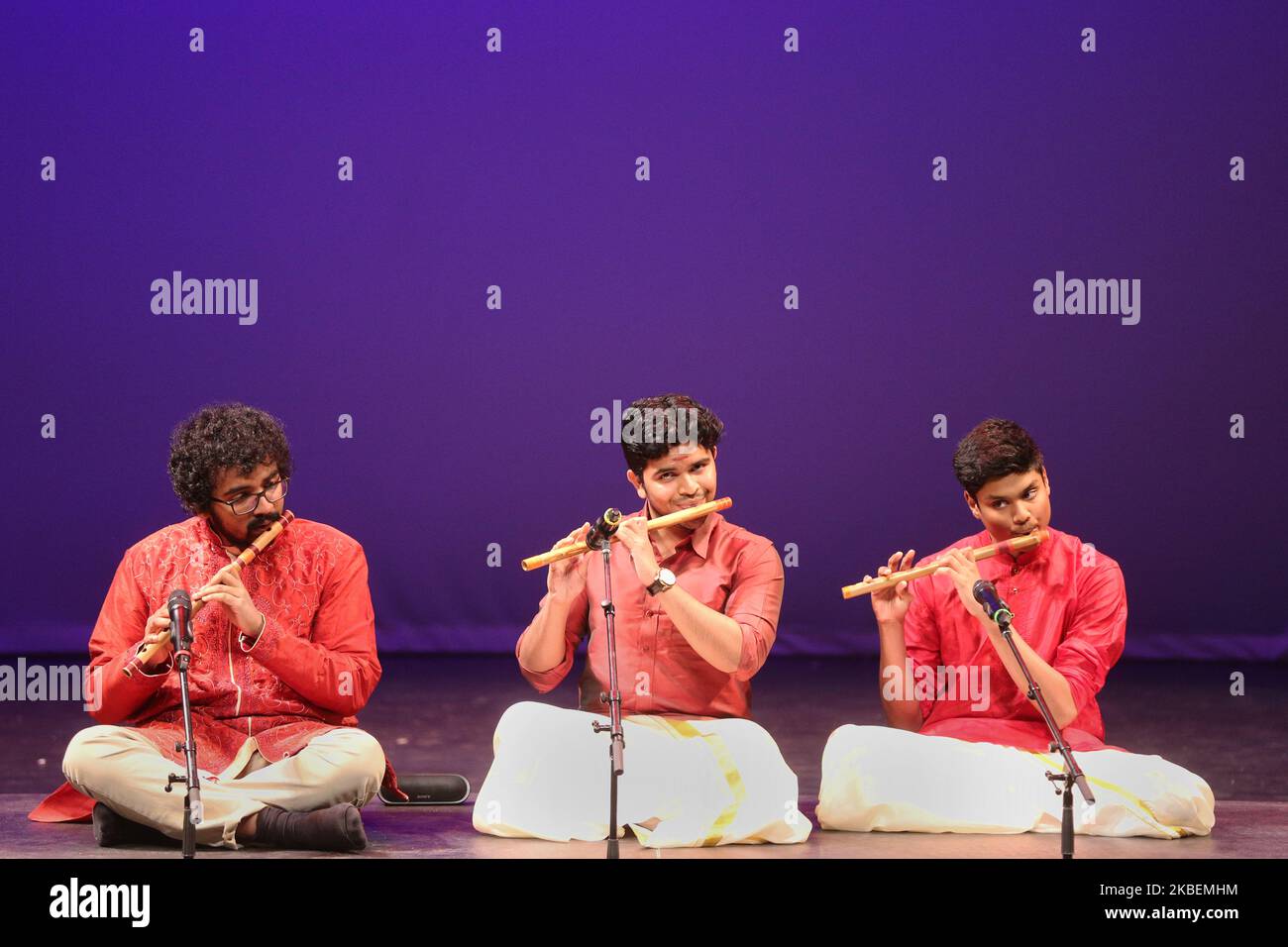 Tamil youth perform a classical song in the traditional Carnatic style ...