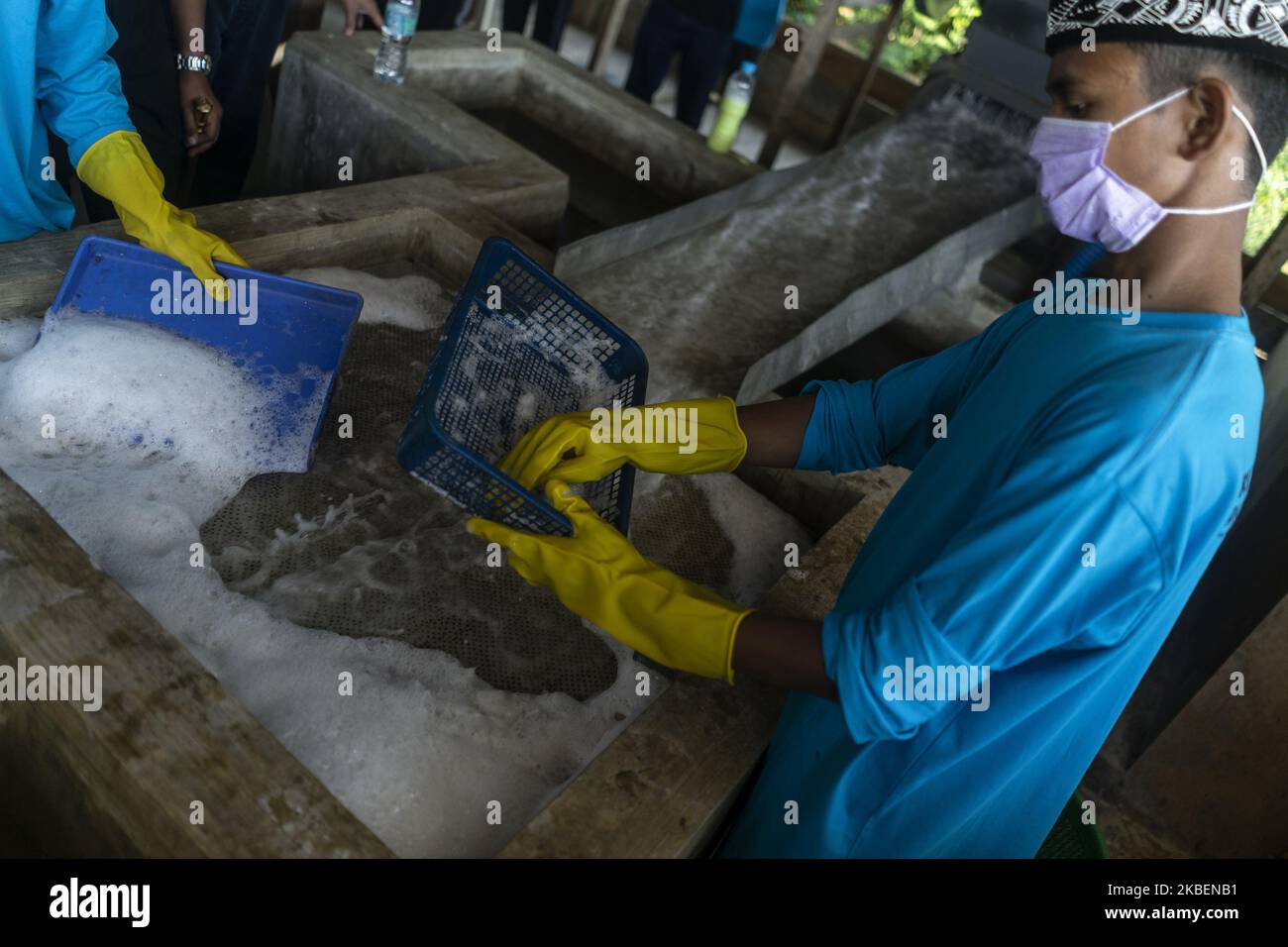 Acehnese students are carrying out the process of recycling plastic ...