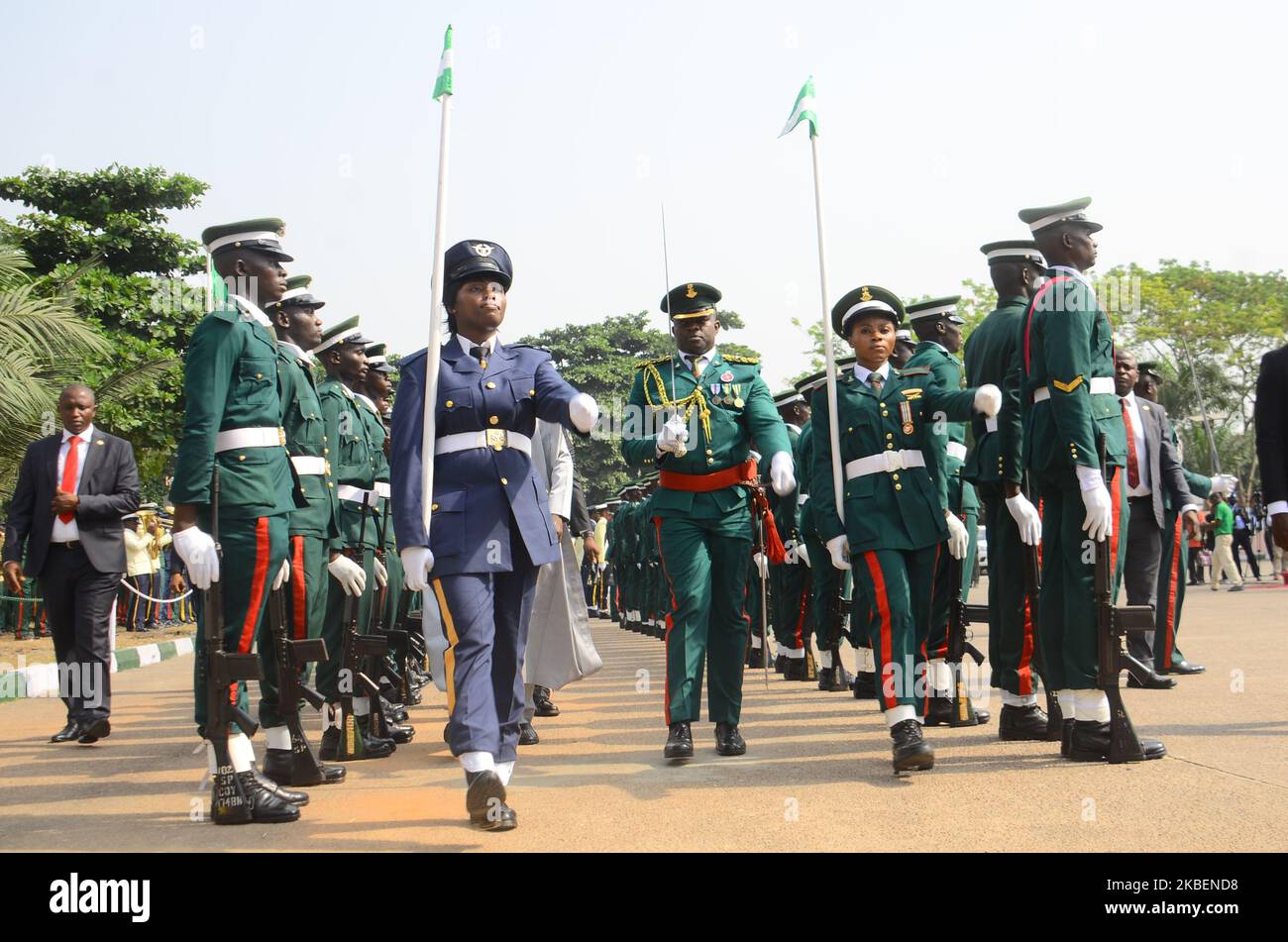 Lagos State Governor Babajide Sonwo-Olu (C) inspects a guard of honour at the military arcade ...
