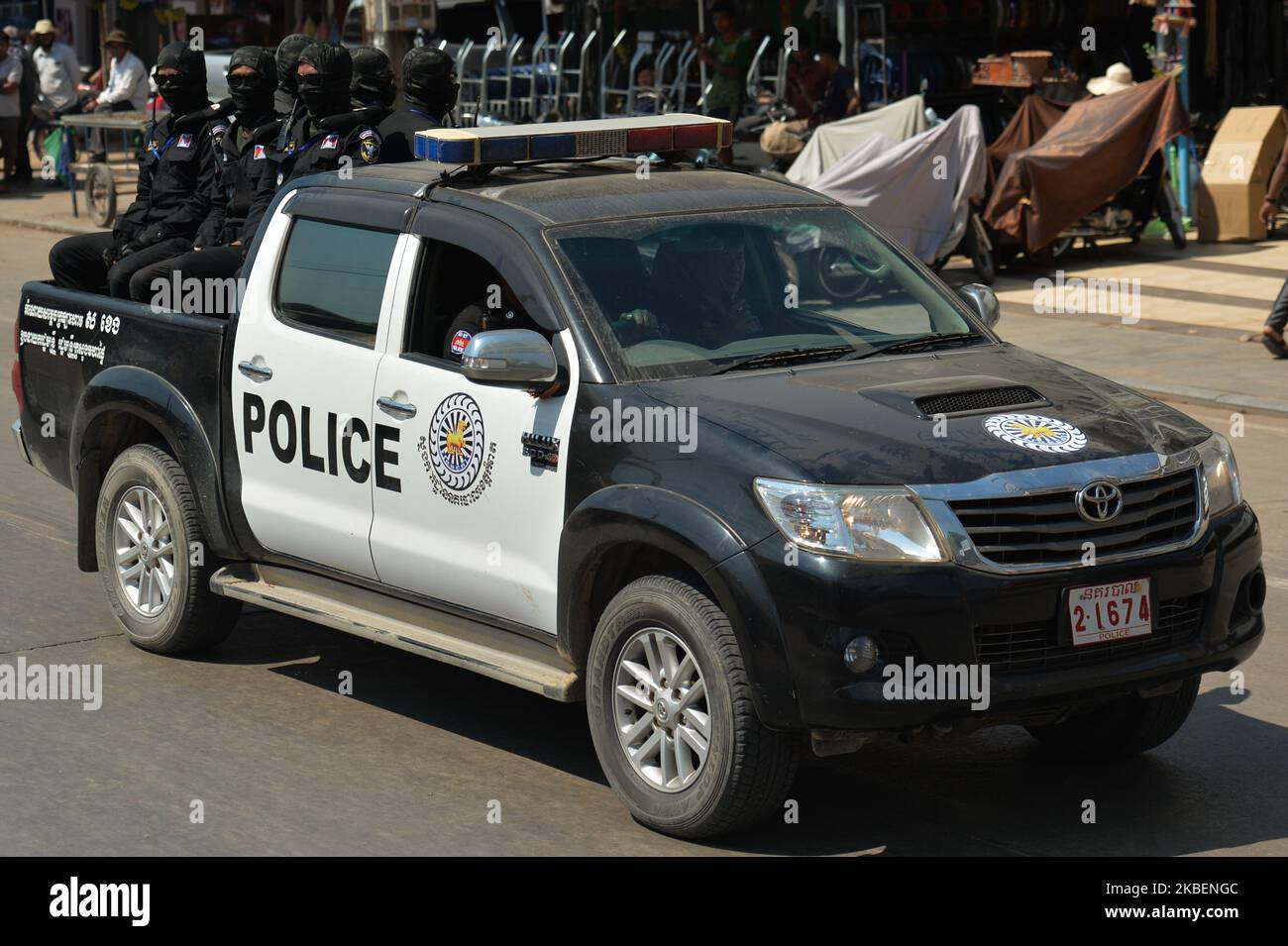 Cambodian Police car seen in the main shopping street in Kampot center ...