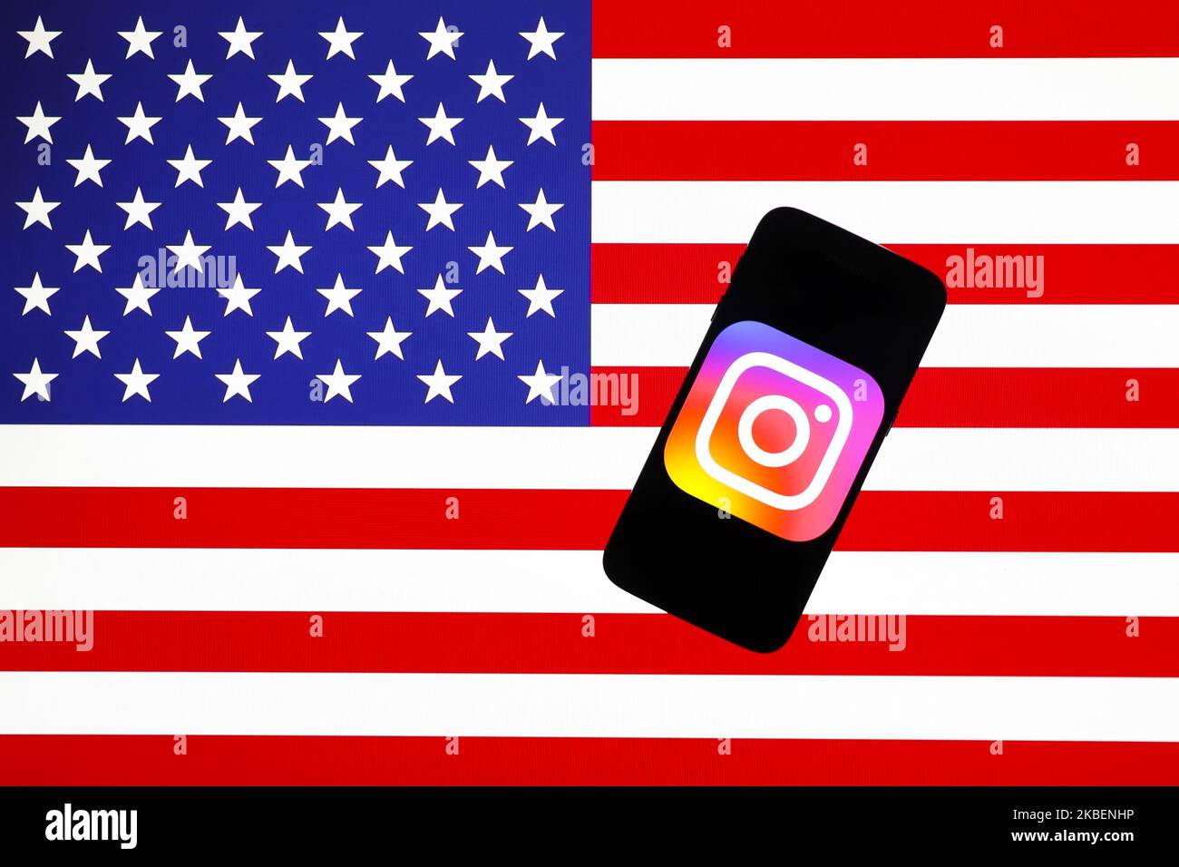 Instagram logo is displayed on a mobile phone screen photographed on U ...