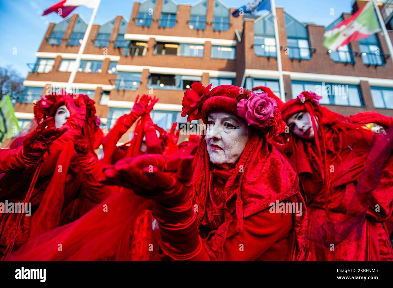 The Red Rebel Brigade is performing in front of the Australian embassy ...
