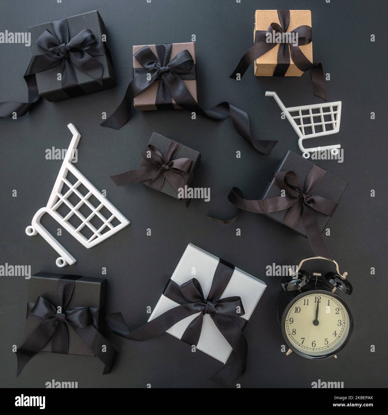 Black Friday Sale flat lay. Christmas gift boxes, Shopping Cart and ...