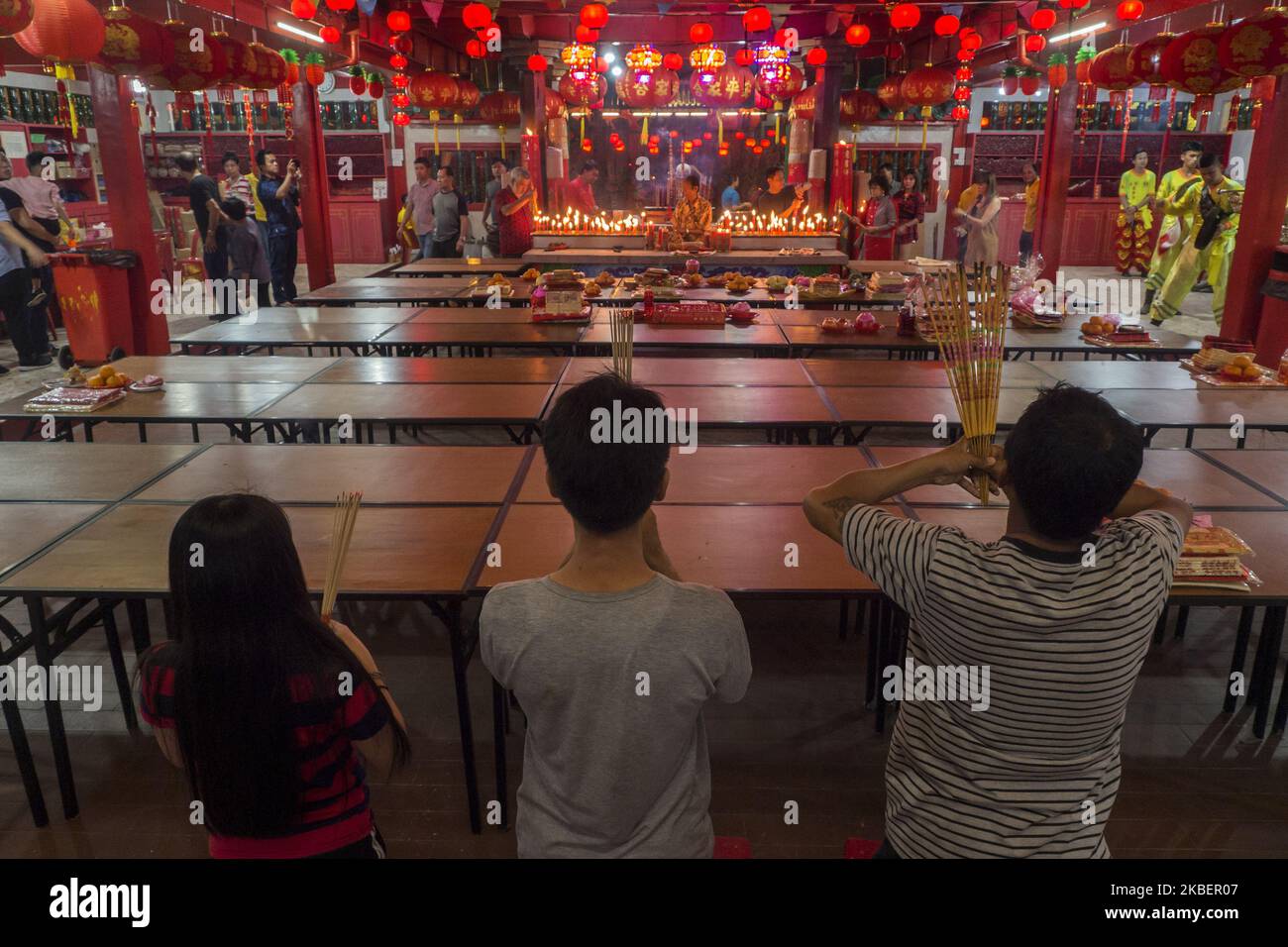 Chinese descendants perform prayers at the end of 2570 Chinese calendar ...
