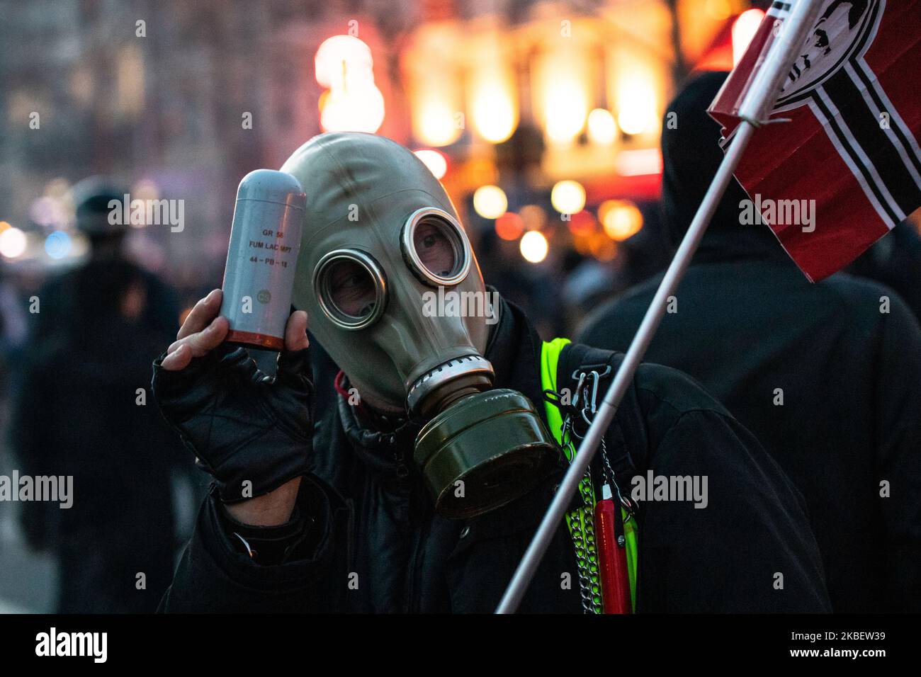 A demonstrator wearing a gas mask during the 62th round of yellow vest ...
