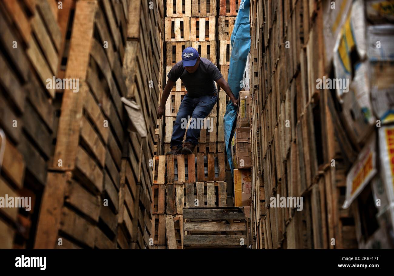At the Central de Abasto in Mexico City, thousands of wooden boxes are ...