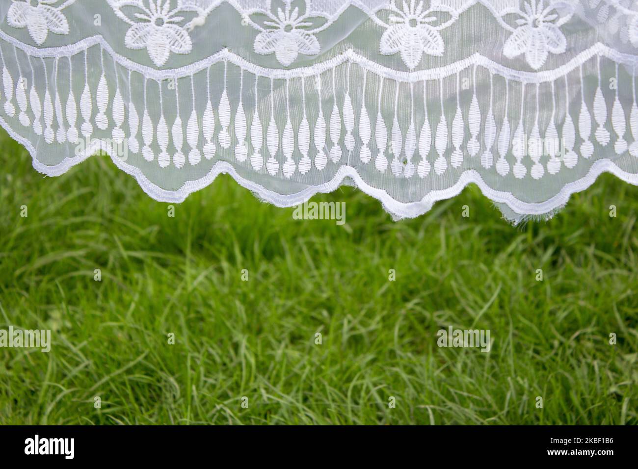 white curtain over the grass after washing Stock Photo - Alamy