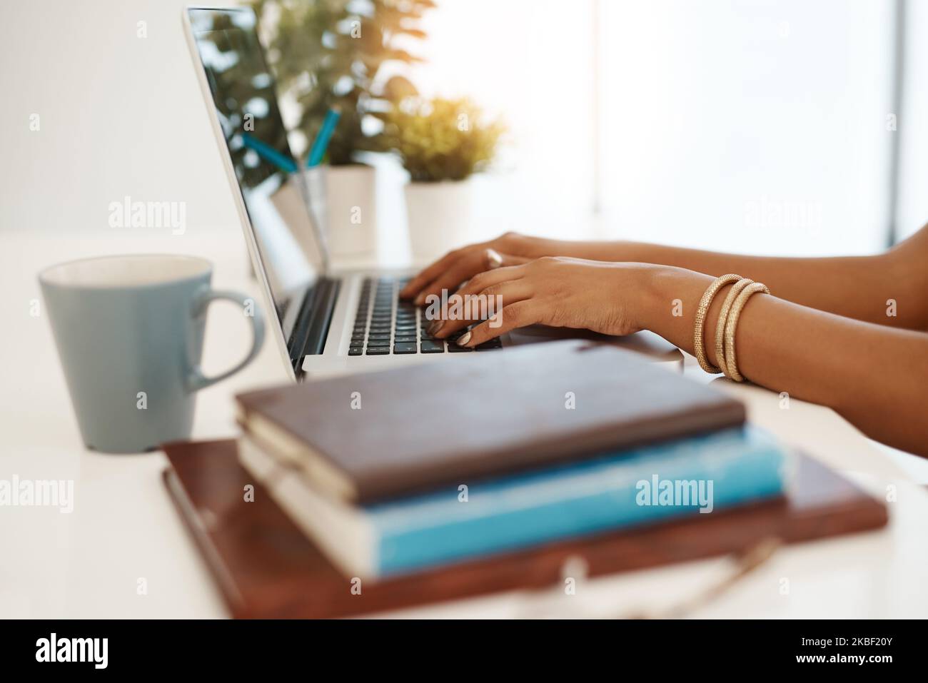 Handle your business and make things happen. a businesswoman using a ...