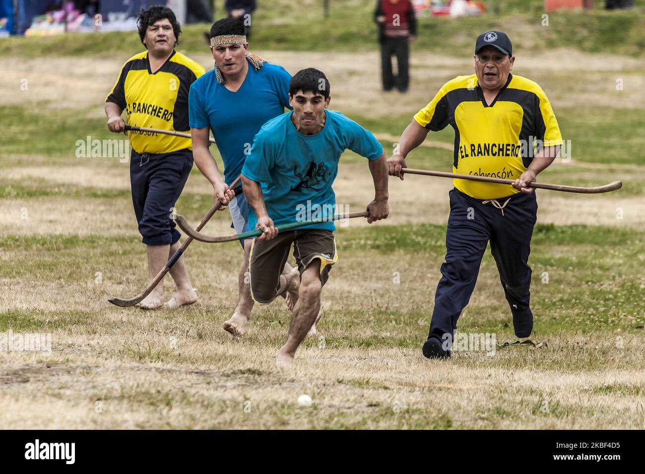 Members of Mapuche Huilliche communities play Palin. With the efkutun ...