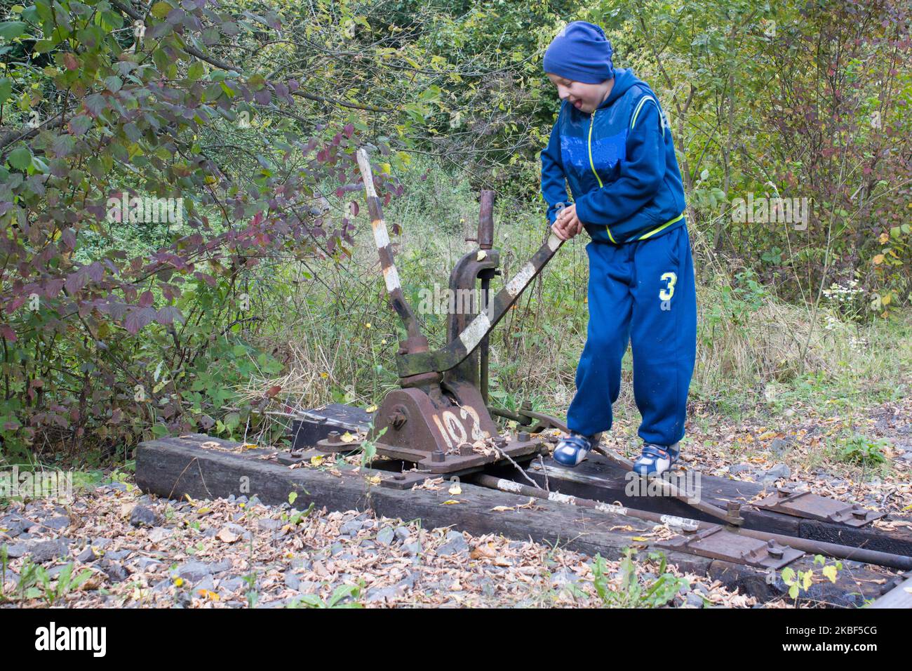 Boy on railroad track hi-res stock photography and images - Alamy