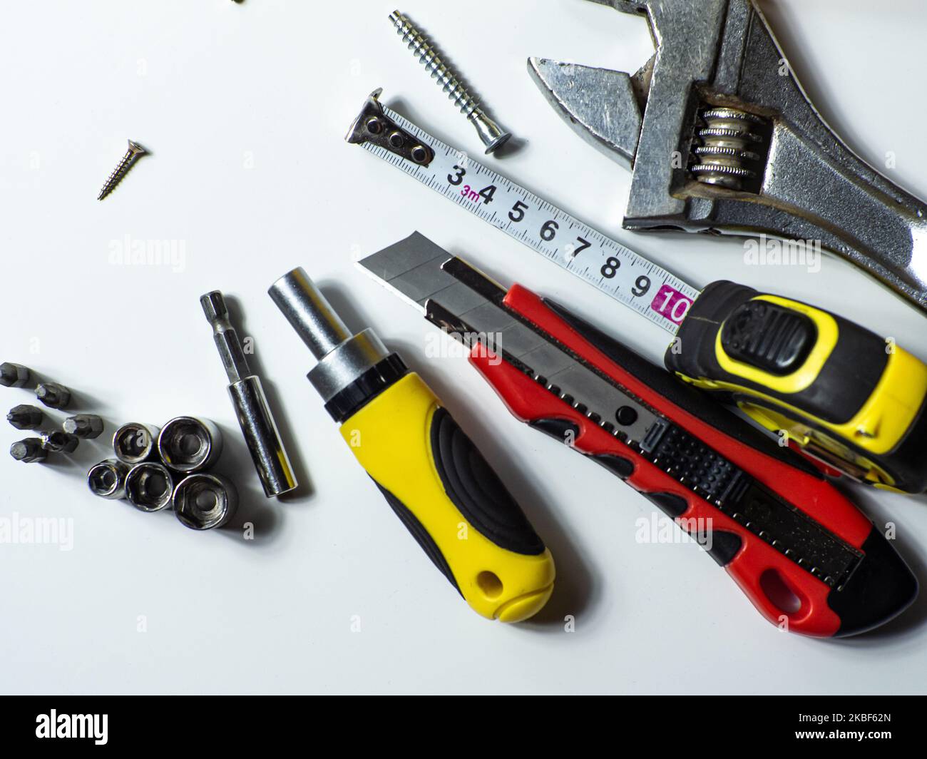 Construction tools on white background with copy space Stock Photo - Alamy